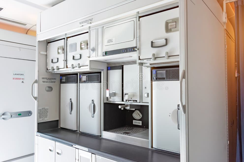 Kitchen Inside Airplane. Preparing Food for the Passengers in the Empty ...