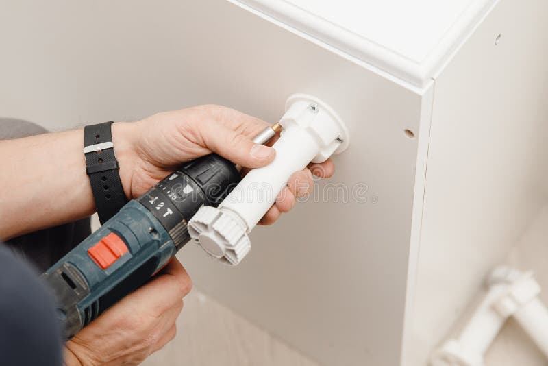 Kitchen Installation, Worker Twists Legs for Box Stock Image - Image of ...
