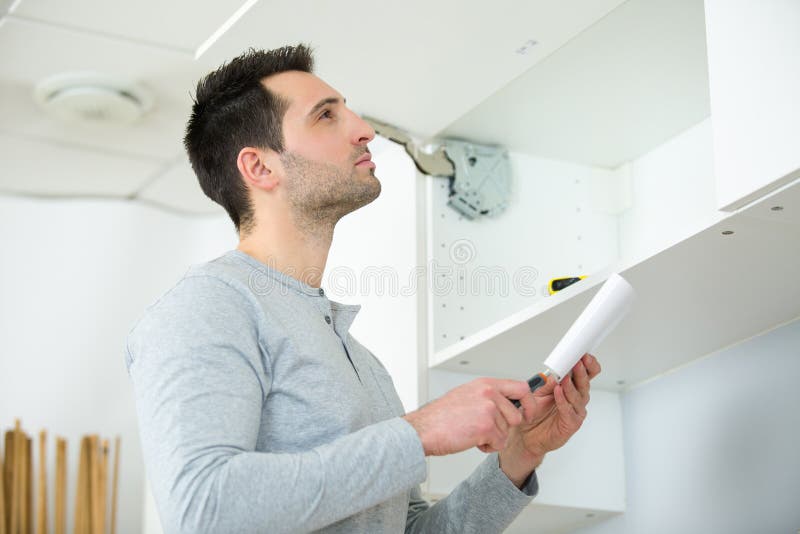 Kitchen Installer at Carpenter Work Stock Photo - Image of expert ...