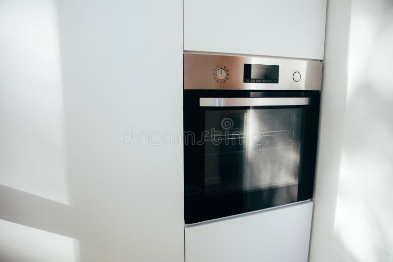 Kitchen Interior. a Modern Open Oven Built into a White Kitchen Stock ...