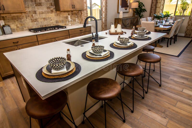 Kitchen Island Counter Top with Five Place Settings Stock Photo - Image ...