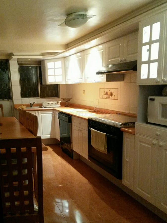 Kitchen lighting at night stock image. Image of integral - 93132759