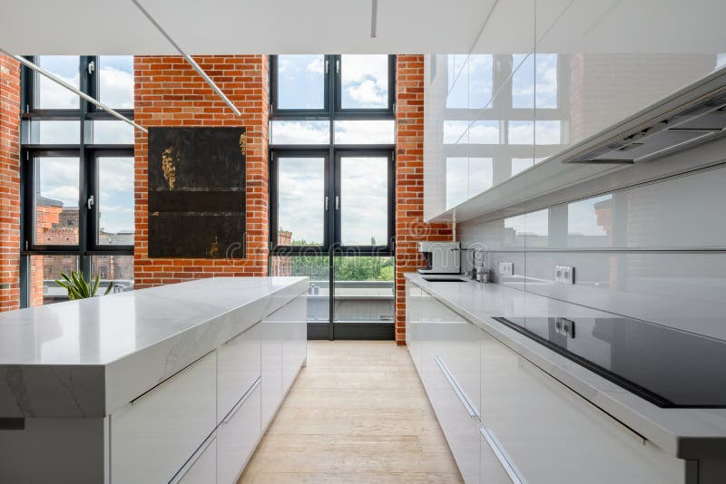 Kitchen in Loft Apartment with Big Windows Stock Image - Image of ...