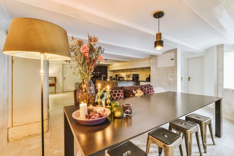 A Kitchen with a Long Counter and a Long Table Stock Image - Image of ...