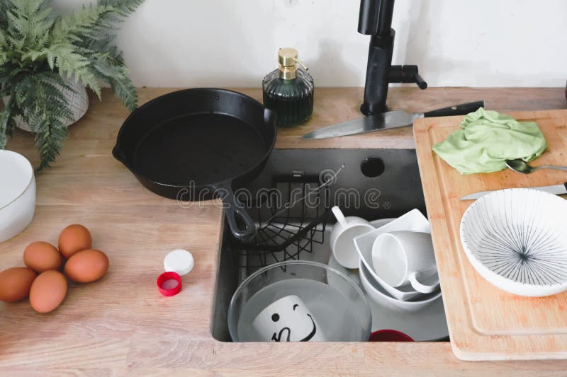 Kitchen Mess. a Top-down View of a Kitchen Sink Filled with Dirty ...
