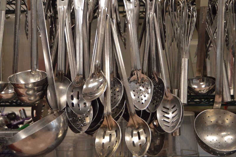 Rack of metal kitchenware stock image. Image of details - 63286935