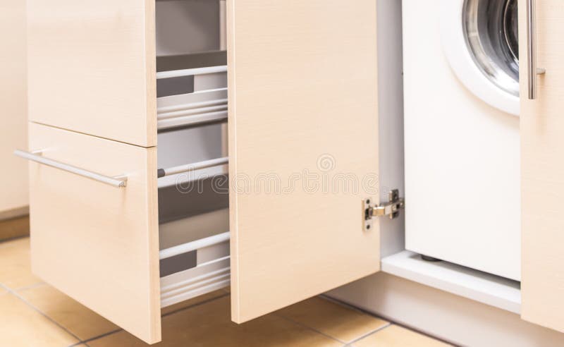 Kitchen Mini Cabinet with Portrable Washing Machine Inside Stock Image ...