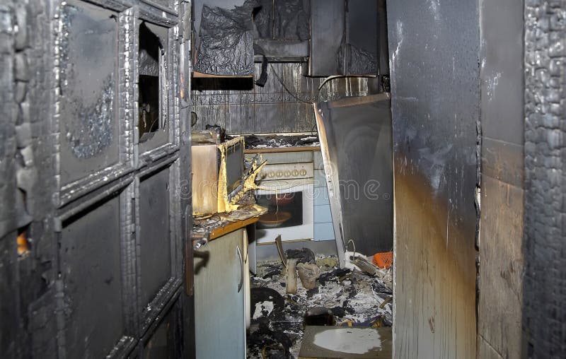 Kitchen with an Old Oven Burned Out after a Fire in a House. Stock ...