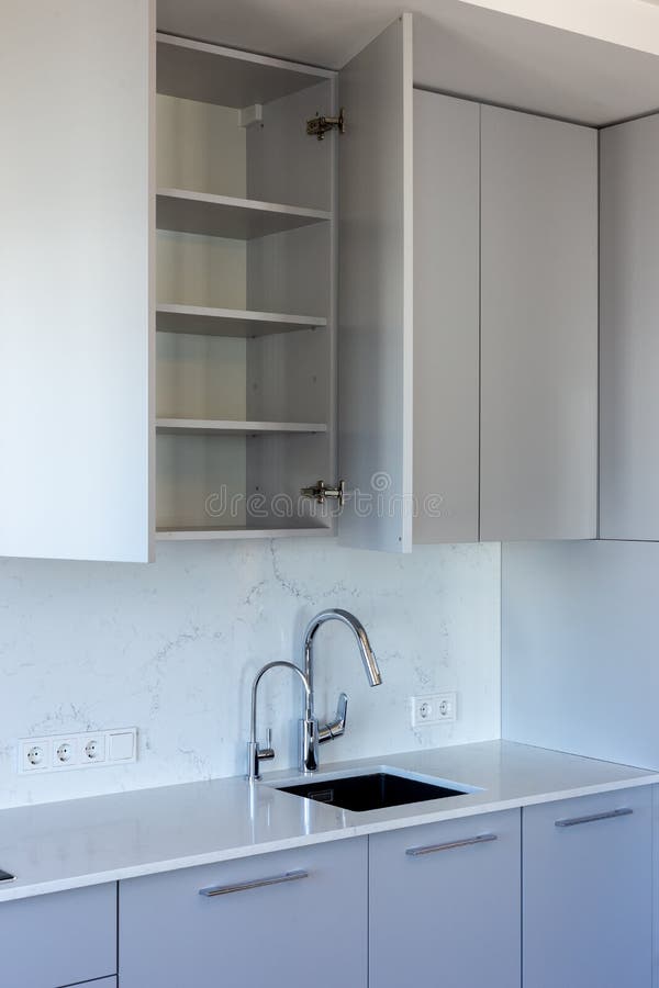 Kitchen with Open Cabinet and Empty Shelves Stock Photo - Image of ...