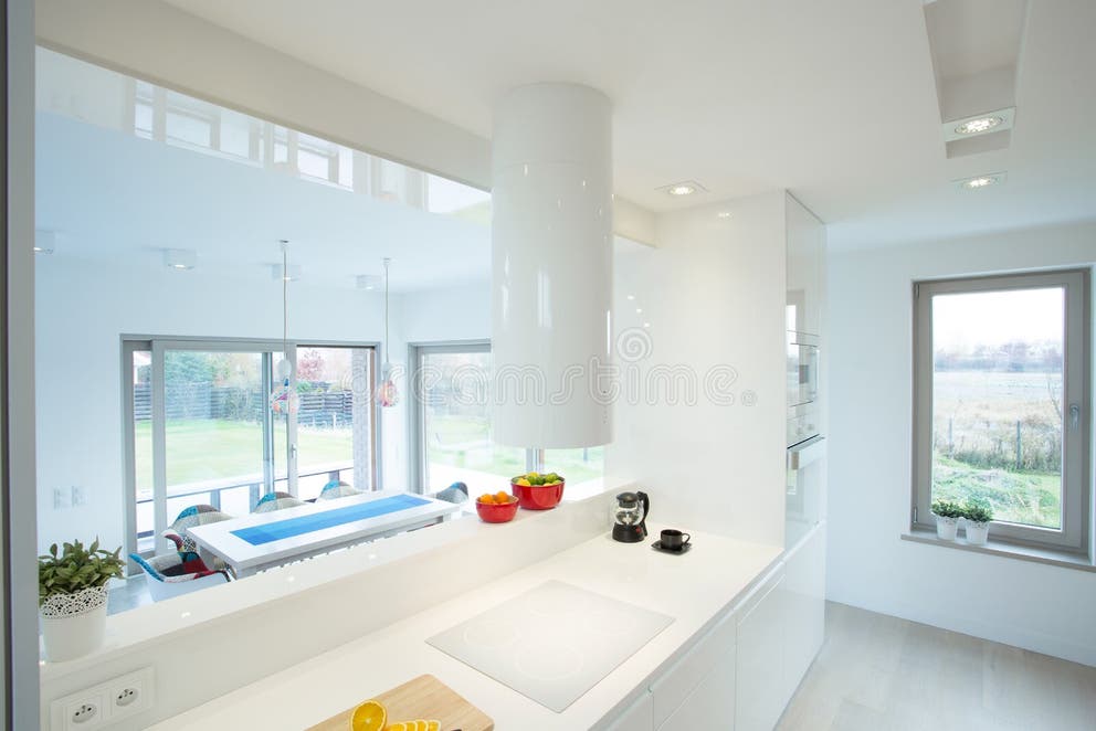 Kitchen Overlooking at Dining Area Stock Image - Image of floor ...