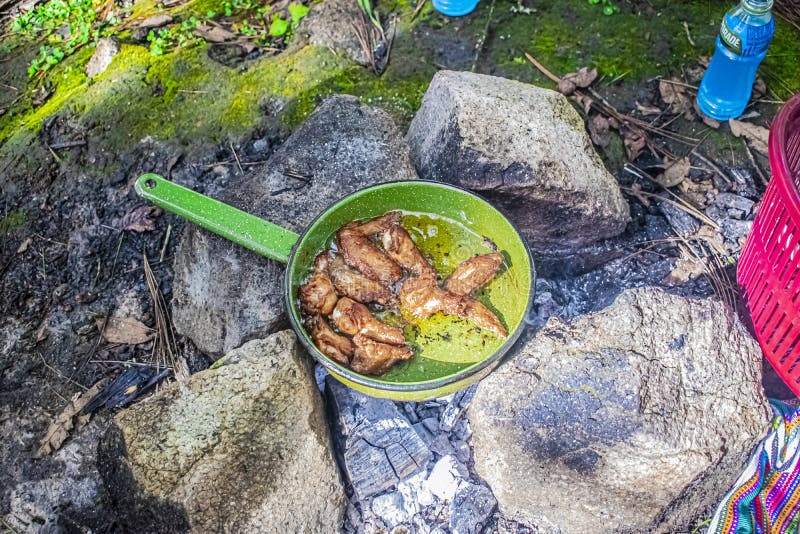 Kitchen Pan on Stones and Chicken Wings with Cajola Fire Stock Photo ...