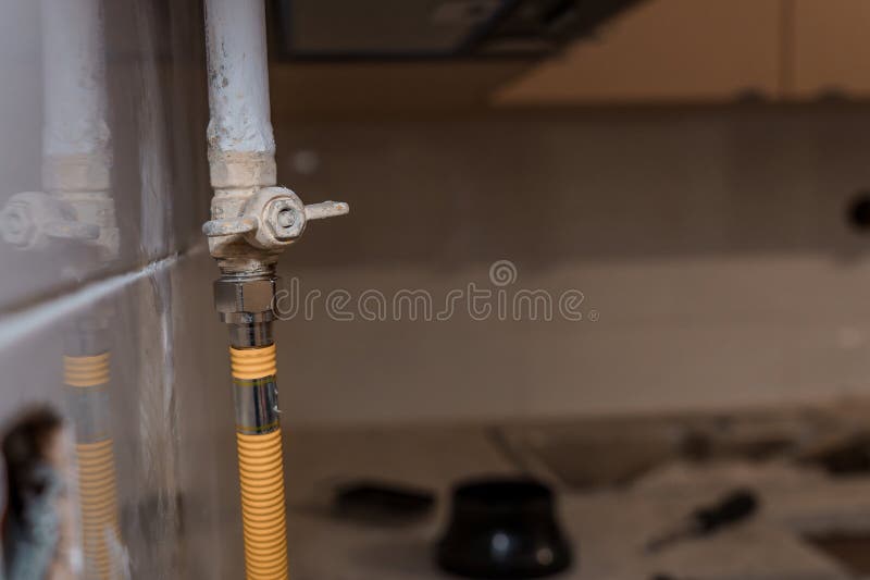Kitchen Plumbing with Visible Valve and Connection in a Renovating ...