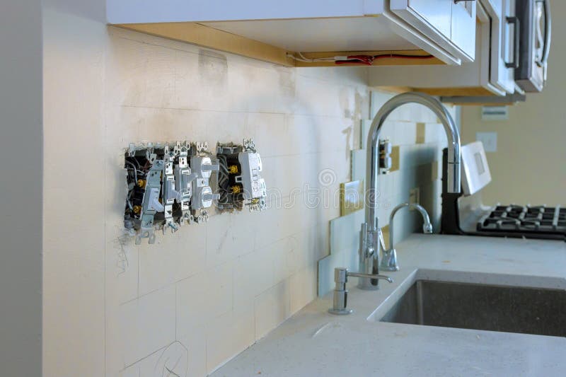 Kitchen Renovation Process Showcasing Electrical Outlet Installation in ...