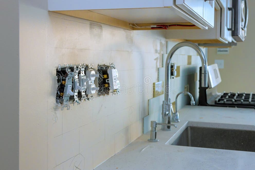 Kitchen Renovation Process Showcasing Electrical Outlet Installation in ...