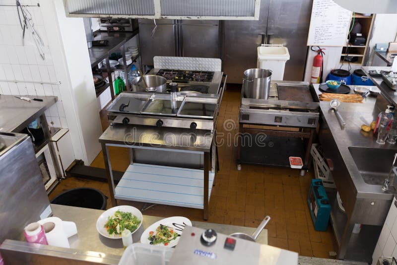 Kitchen in restaurant stock photo. Image of chrome, culinary - 193083776