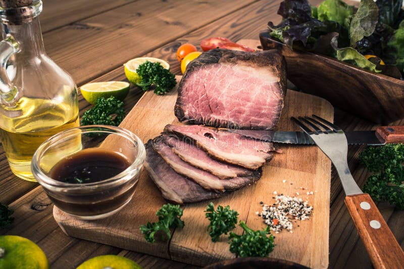 Kitchen and Roast Beef and Vegetables and Condiments Stock Photo ...