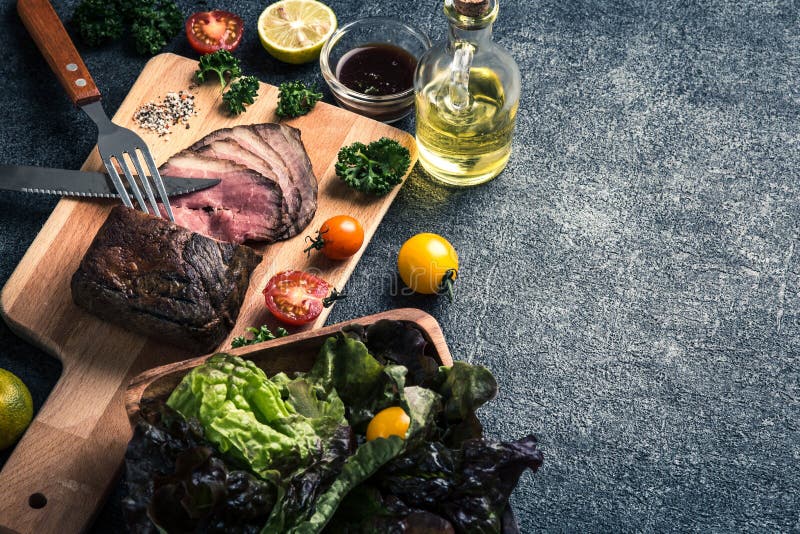 Kitchen and Roast Beef and Vegetables and Condiments Stock Image ...