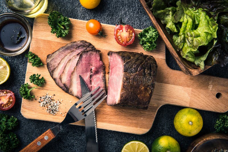 Kitchen and Roast Beef and Vegetables and Condiments Stock Photo ...