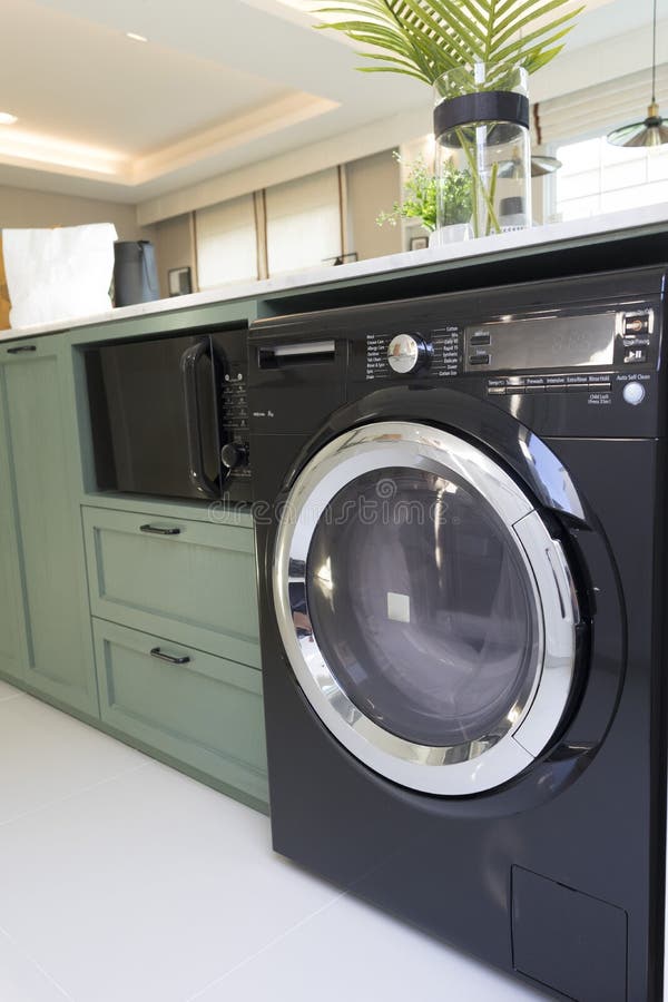 Kitchen Room with Washing Machine in a Home Stock Image - Image of east ...