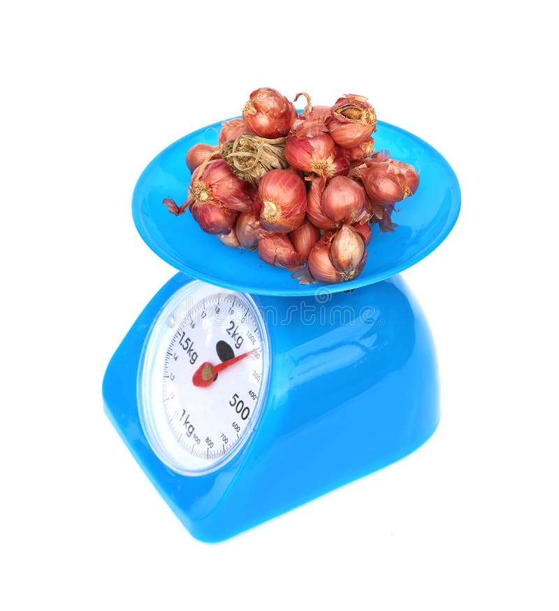 Kitchen scales and onions stock photo. Image of measuring - 42205438