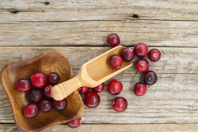 Kitchen Scene with Fresh Cranberries on Rustic Table Stock Image ...