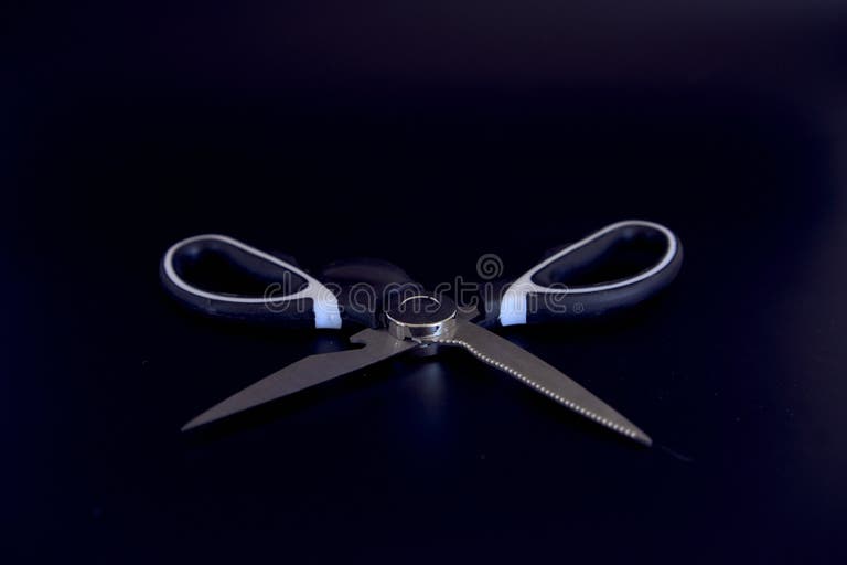 Kitchen Scissors with a Jagged Blade on a Black Background Stock Photo ...