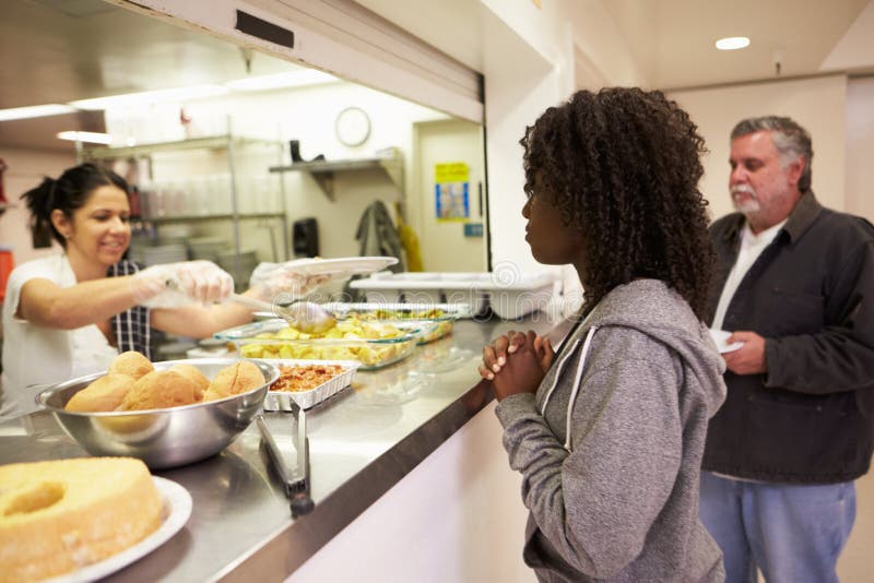 Kitchen Serving Food In Homeless Shelter Stock Photo - Image: 39218460