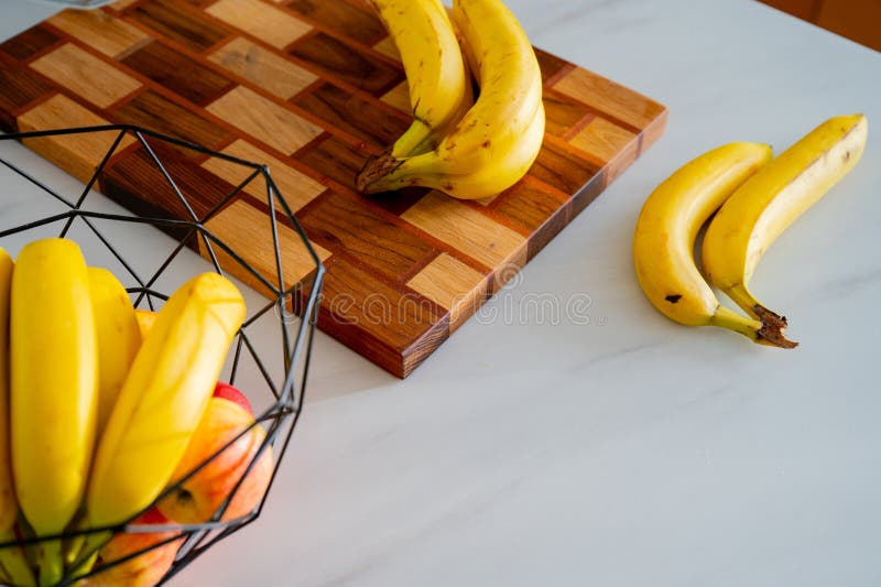 Kitchen Setup with Banana Bread and a Ripe Banana, Illuminated by ...