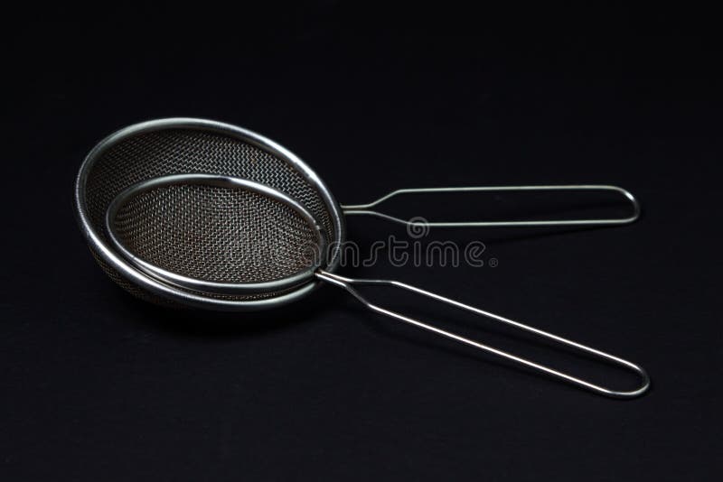 Kitchen Sieve on a Black Background. Stock Image - Image of sift, goods ...