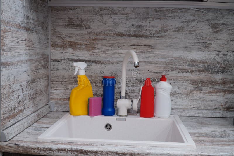 Kitchen Sink with Bottles of Cleaning Products, Cleaning Supplies and ...