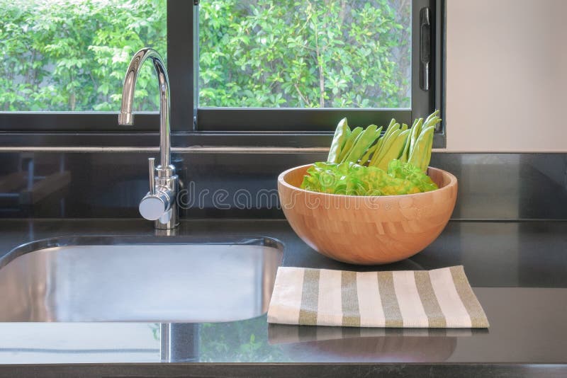 Kitchen Sink with a Bowl of Vegetables in the Kitchen Stock Photo ...