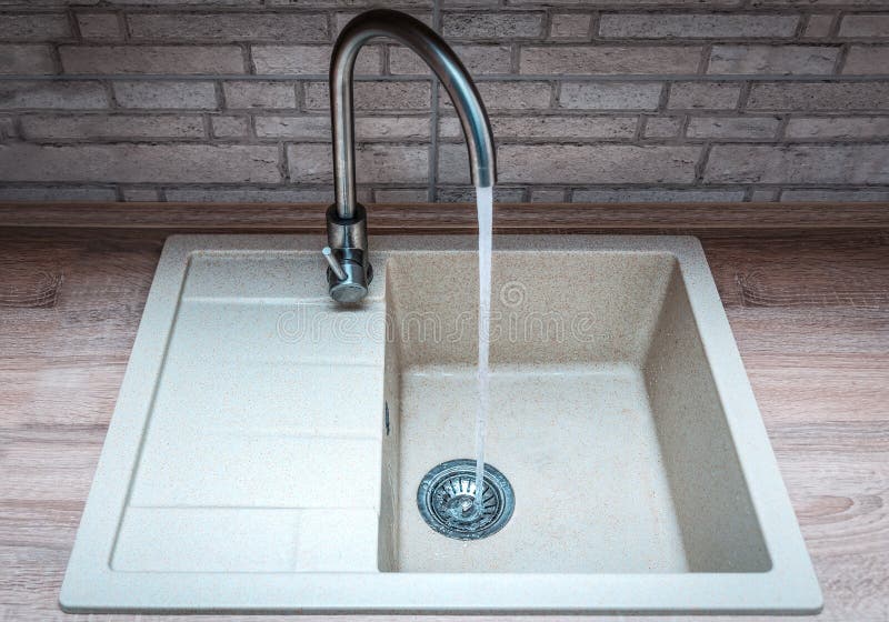 Kitchen sink with water on stock image. Image of plumbing - 178688079