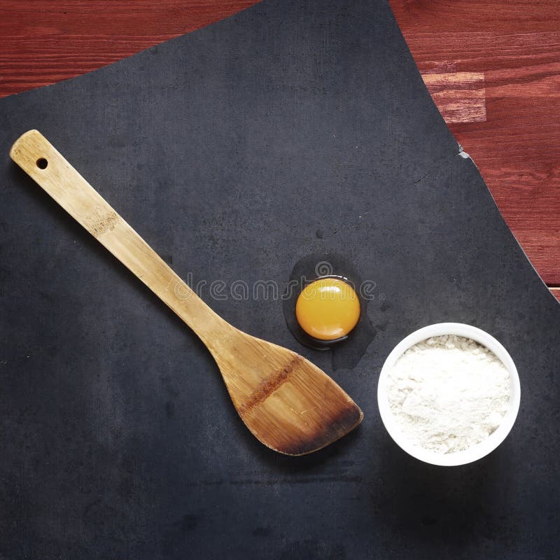 Kitchen spatula and egg stock image. Image of tools - 320030579