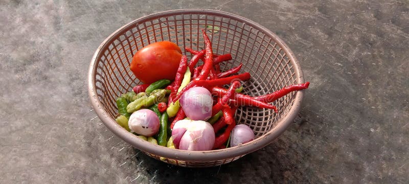 Kitchen Spices on a Plastic Colander on a Wooden Table Background Stock ...