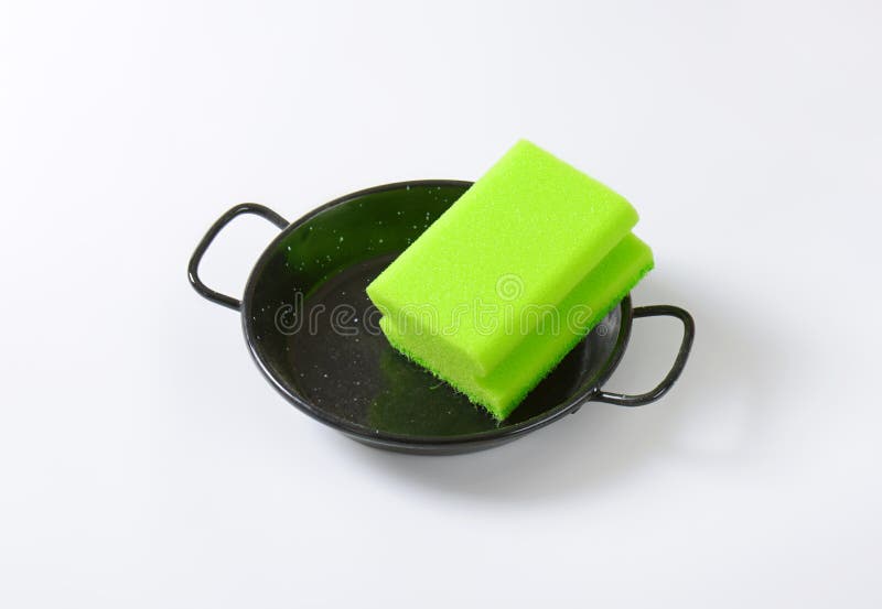 Kitchen sponge on skillet stock image. Image of sponge - 58187973