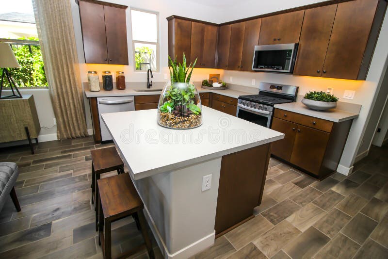 Kitchen with Square Island and Bar Stools Stock Image - Image of ...