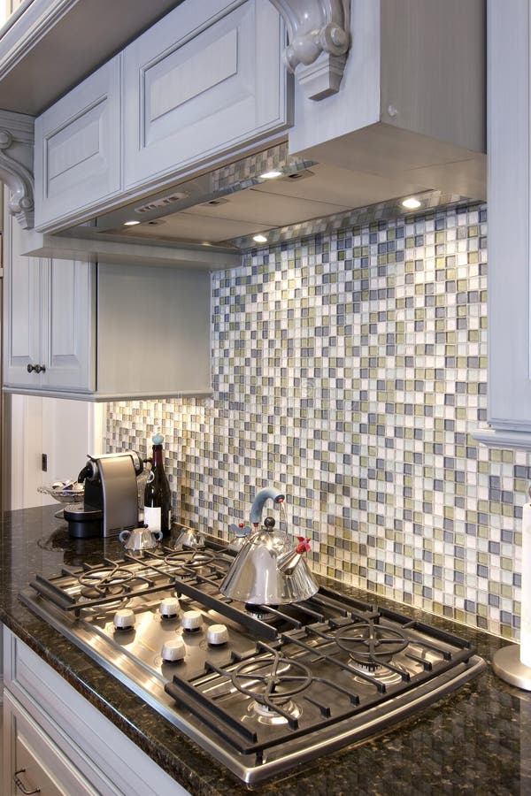 Kitchen Stove and Backsplash Stock Photo - Image of hood, decorate: 7742574