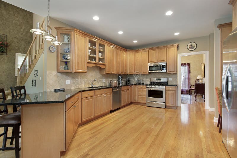 Kitchen with Long Granite Counter Stock Image - Image of house ...