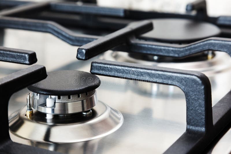 Kitchen Surface in Stainless Steel with Cast Iron Grill. View from ...