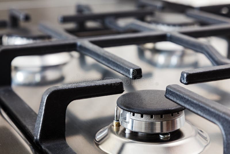 Kitchen Surface in Stainless Steel with Cast Iron Grill. View from ...