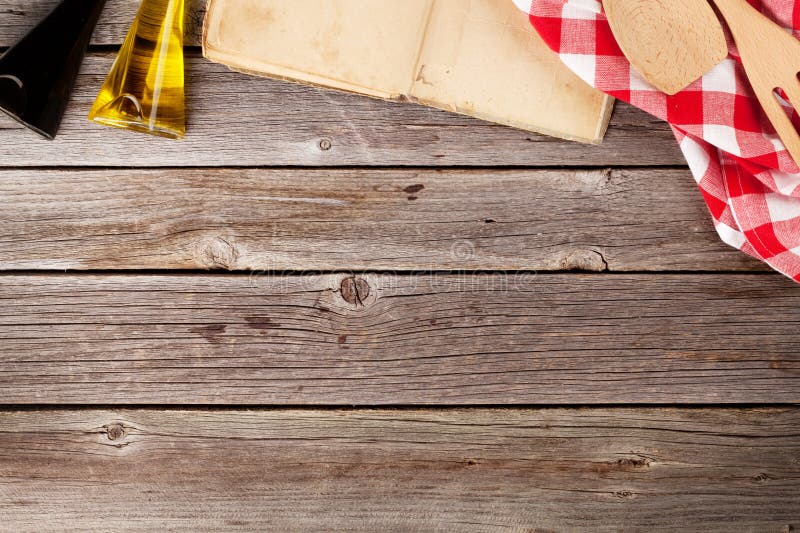 Kitchen Table with Cookbook, Utensils and Ingredients Stock Photo ...