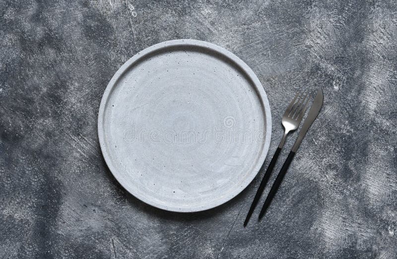 Kitchen Table with Empty Plate and Towel. Cooking Stone Backdrop. Top ...