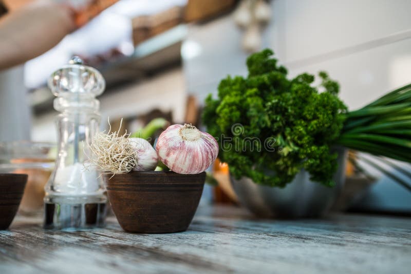 Kitchen table with garlic stock image. Image of nwet - 139629705