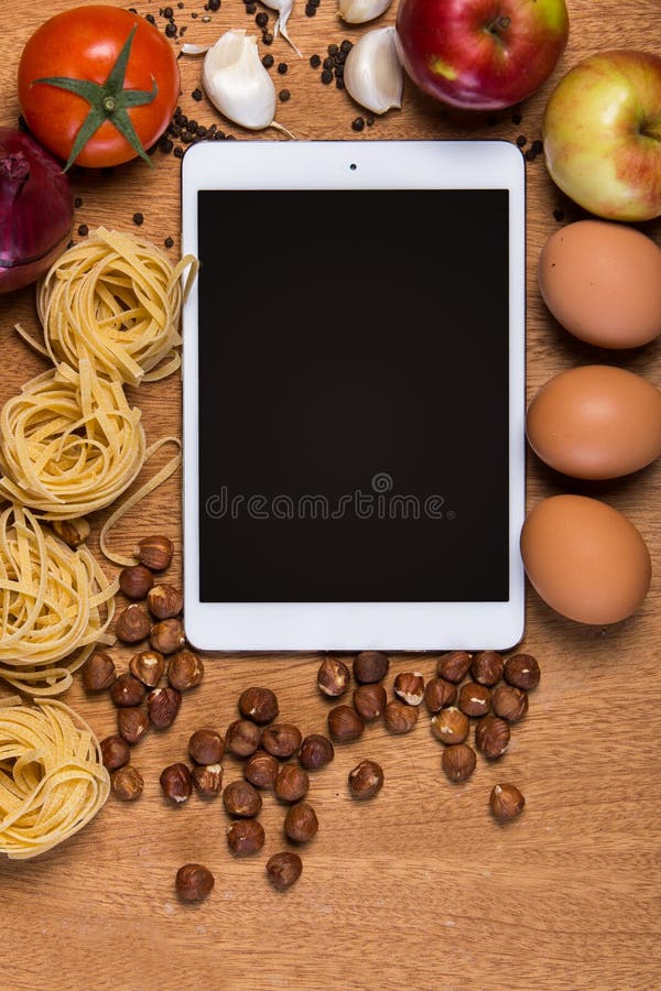 Kitchen. Tablet and food stock image. Image of baking - 41954835