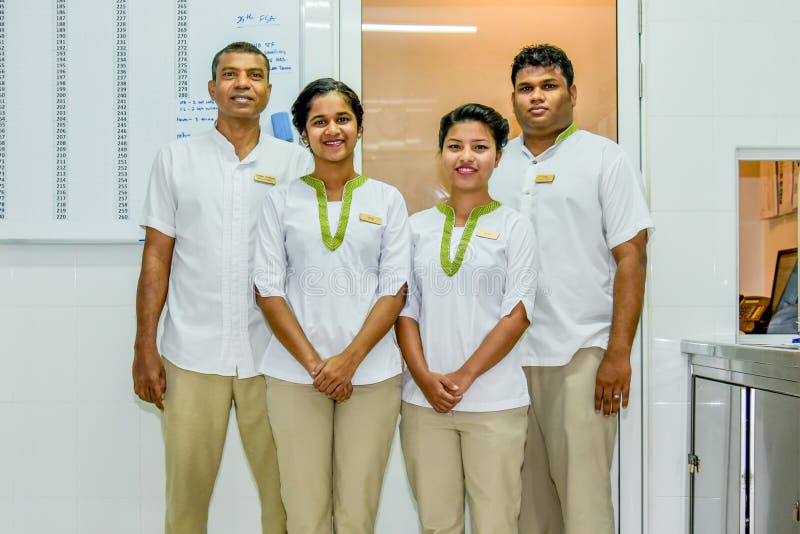 Kitchen Team in Uniform Standing and Smiling Editorial Photography ...
