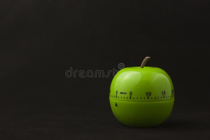 Kitchen Timer in the Shape of Apple Isolated on a Black Background ...