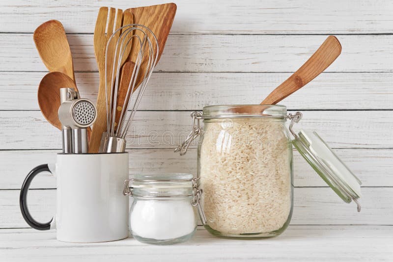 Kitchen Tools and Glass Jar with Rice Stock Photo - Image of ceramic ...