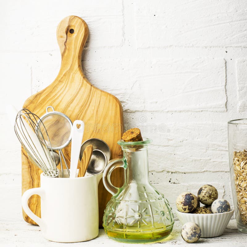 Kitchen Tools, Olive Cutting Board on a Kitchen Shelf Against a White ...