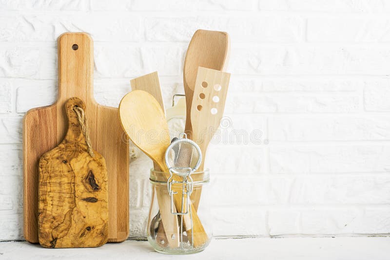 Kitchen Tools, Olive Cutting Board on a Kitchen Shelf Against a White ...