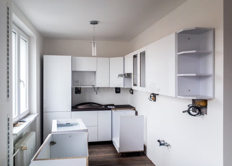 Kitchen under construction stock image. Image of work - 103341079